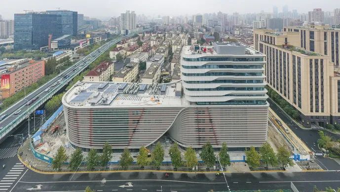 徐汇区牙防所新院雨中开诊接诊600余人次建议半年一次口腔体检